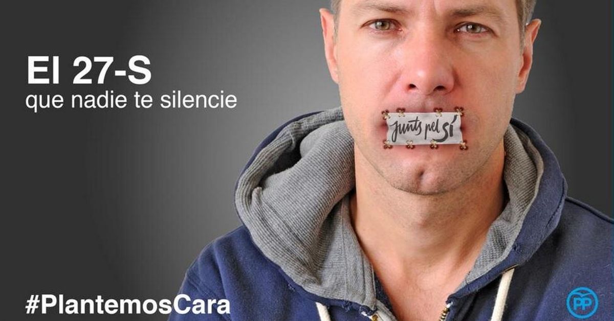 El PP catalán se pone una mordaza con el logo de Junts pel Sí